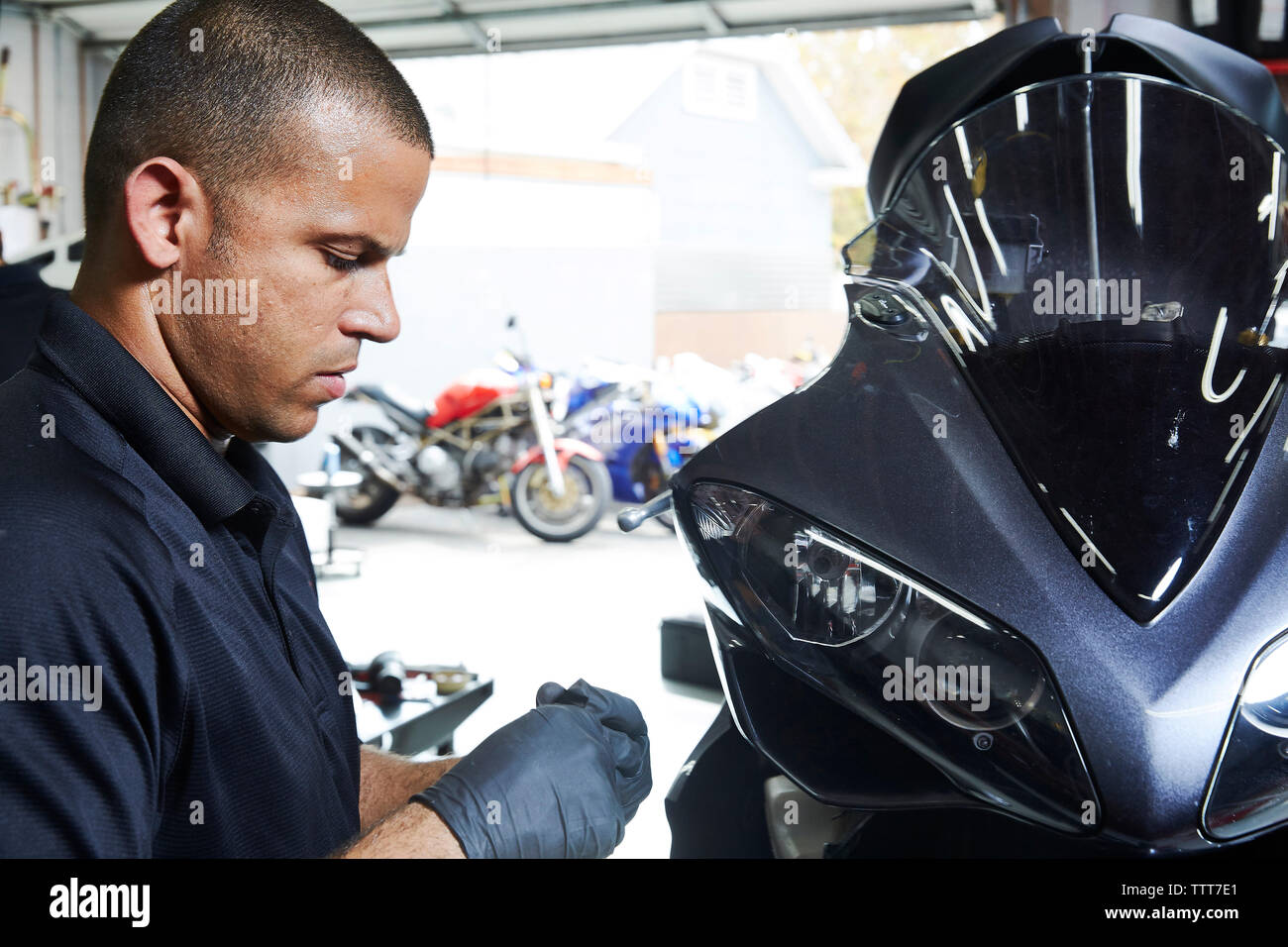 Motorbike worker hi-res stock photography and images - Alamy