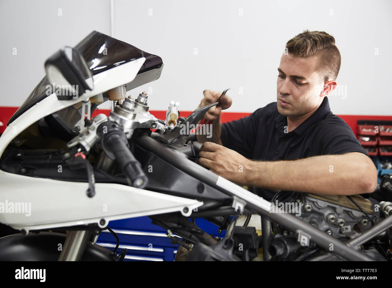 Mechanic working motorcycle workshop hi-res stock photography and ...