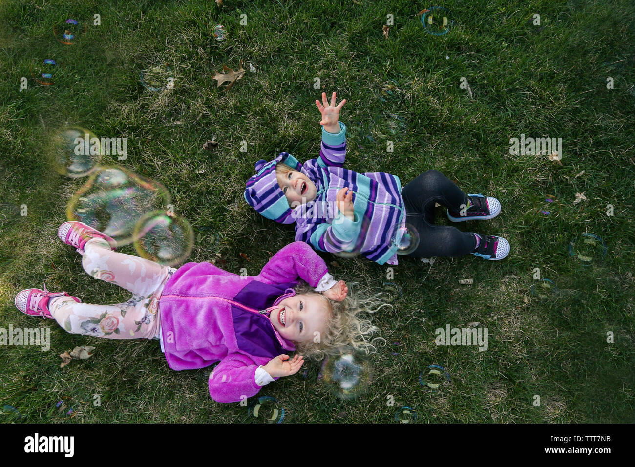 Girls playing with bubbles hi-res stock photography and images - Alamy