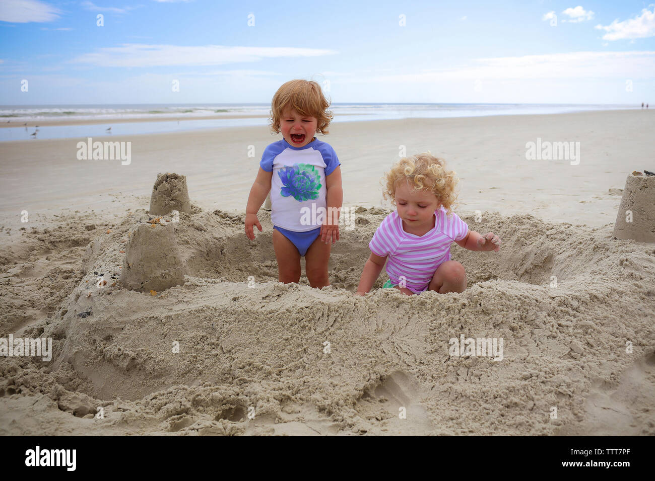 Playing beach sand hi-res stock photography and images - Alamy