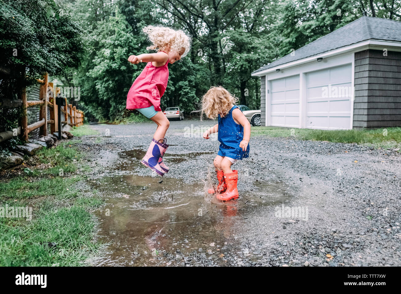 Puddle jumping hi-res stock photography and images - Alamy