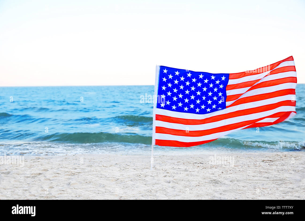 American flag on beach Stock Photo - Alamy