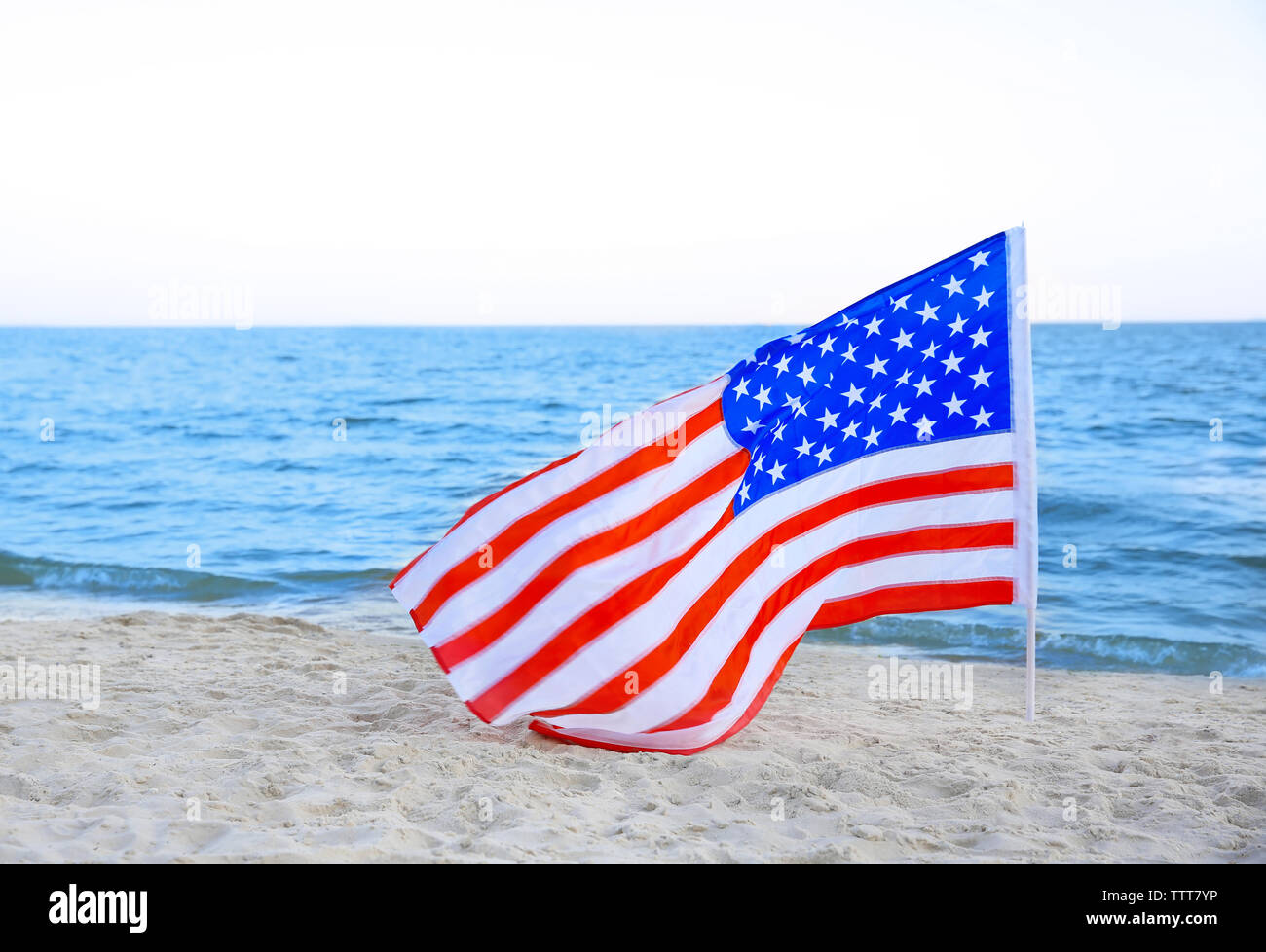 American flag on beach Stock Photo - Alamy