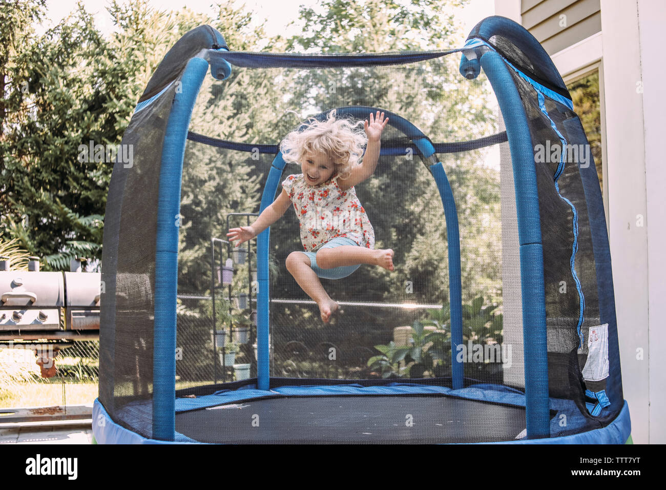 Girl jumping in mid air hi-res stock photography and images - Alamy