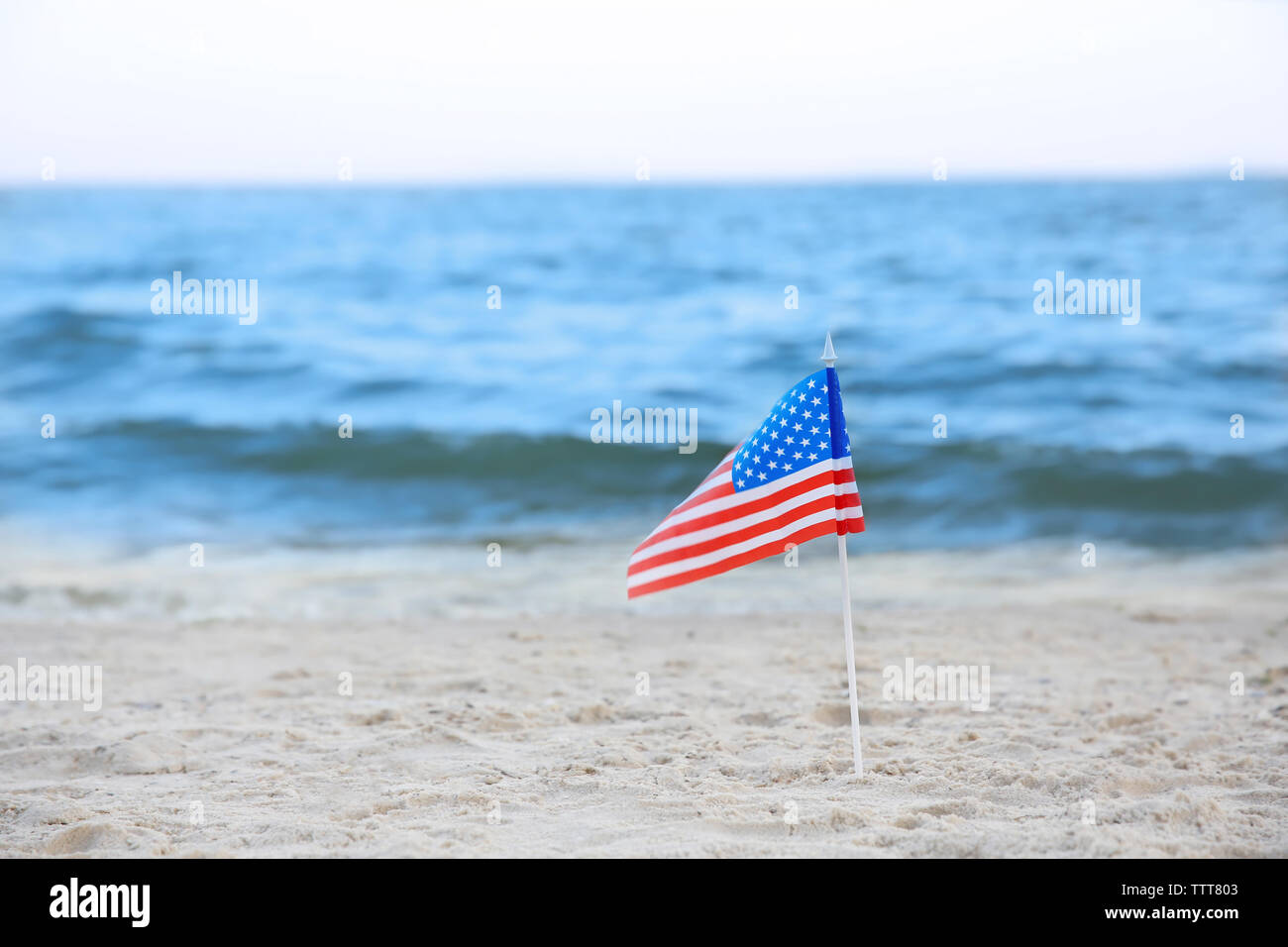 American flag on beach Stock Photo - Alamy