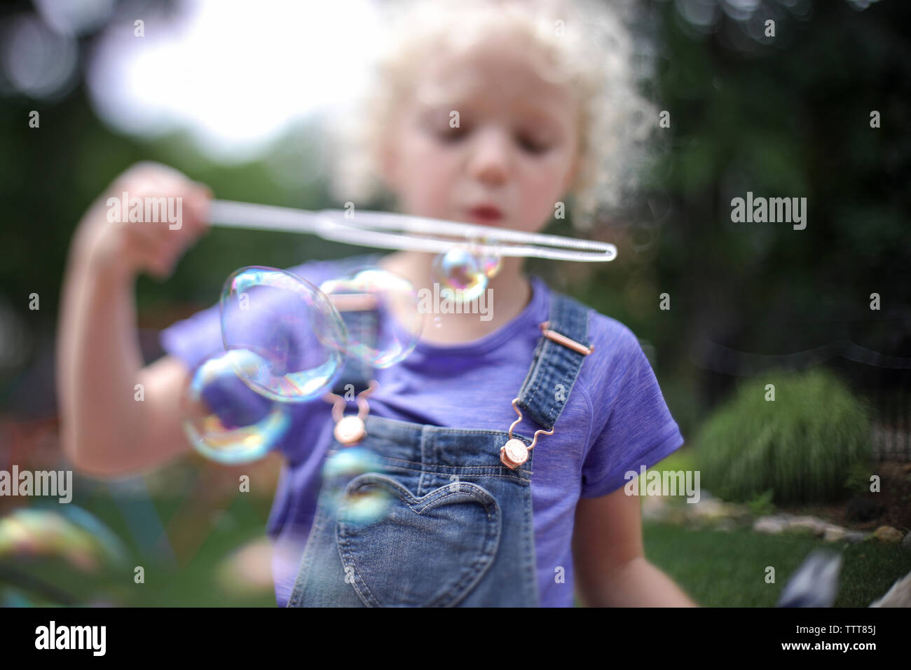 Blowing bubble in bubbles hi-res stock photography and images - Alamy