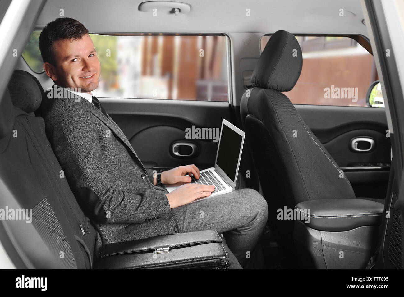 Owner person laptop car hi-res stock photography and images - Alamy