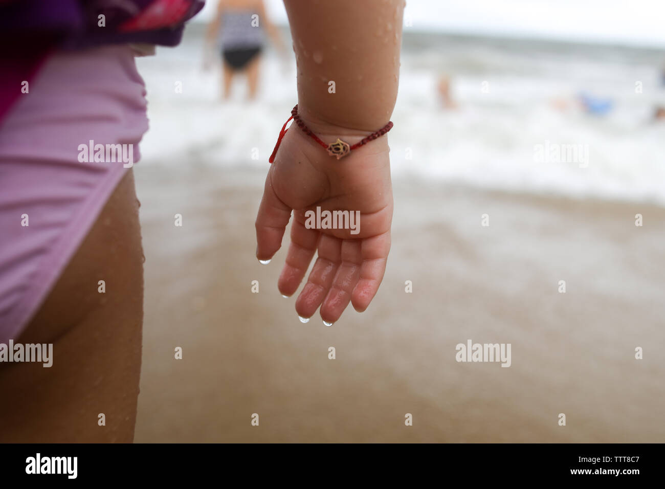 Child water hand hi-res stock photography and images - Alamy