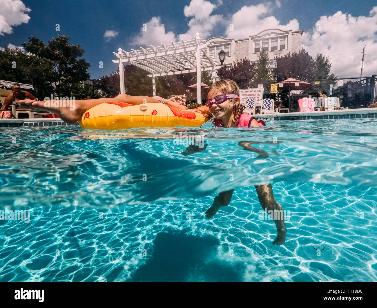 Sisters in swimming pool High Resolution Stock Photography and Images ...