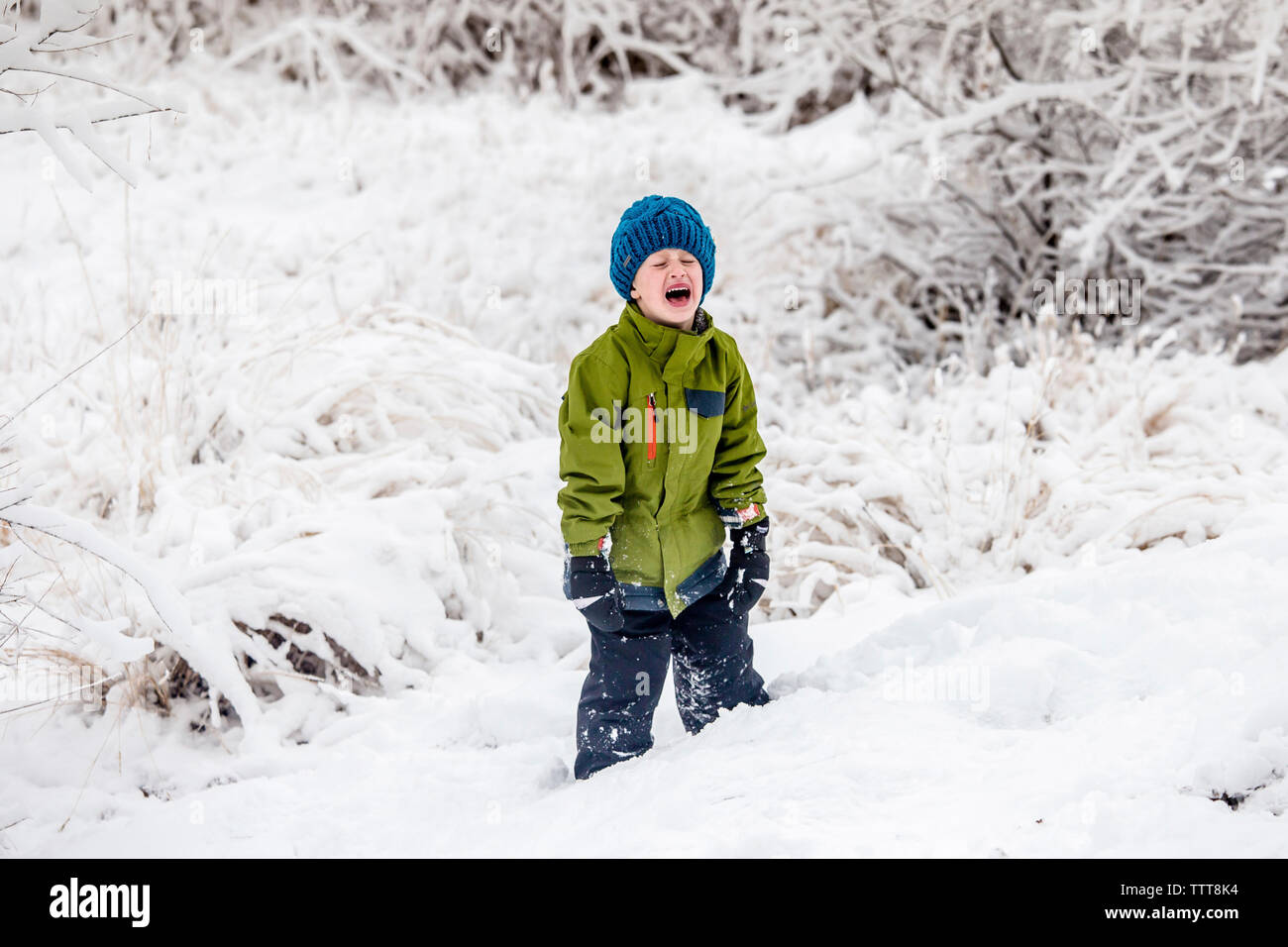Sad boy snow hi-res stock photography and images - Alamy