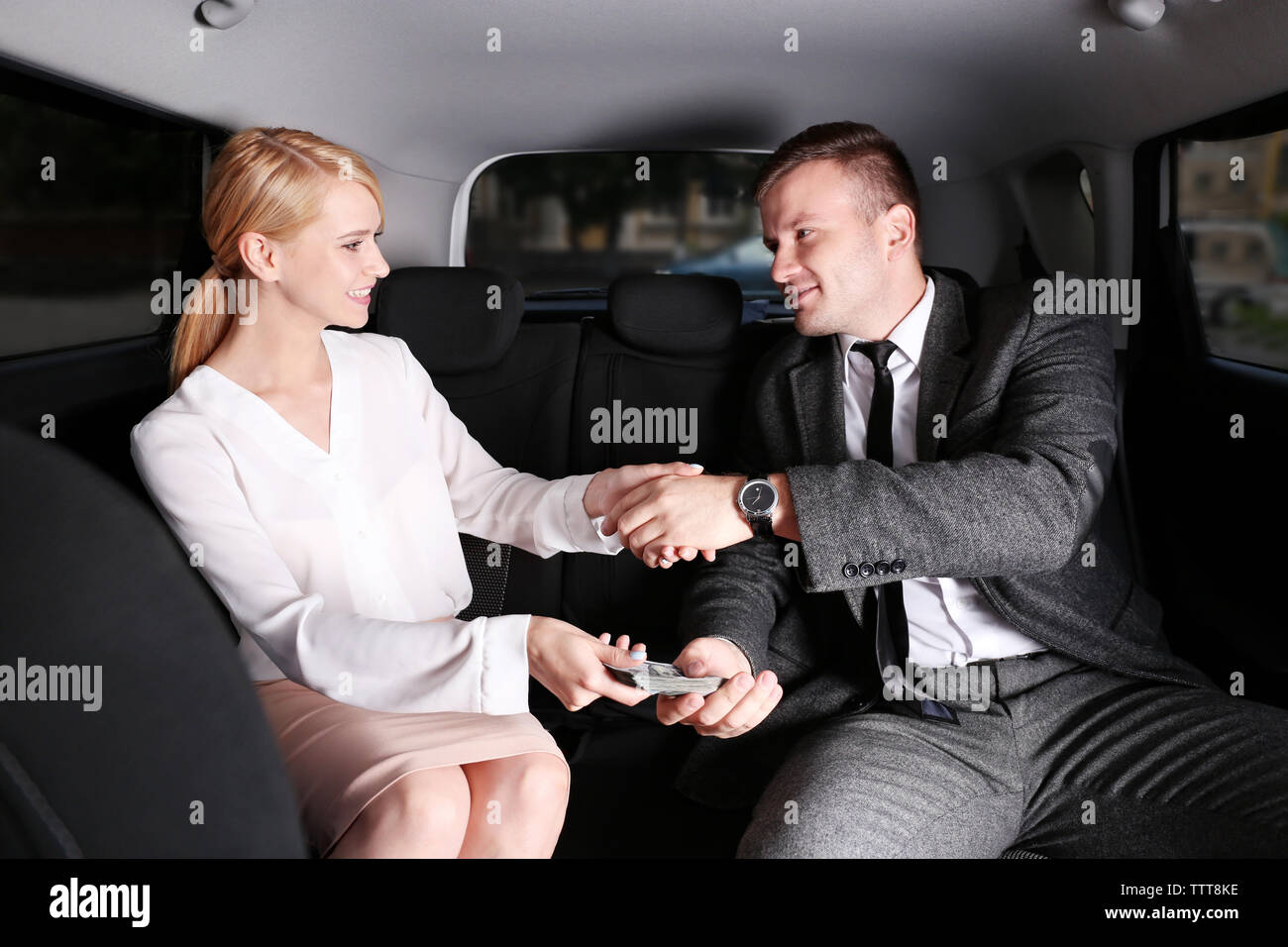 Car passenger handshake hi-res stock photography and images - Alamy