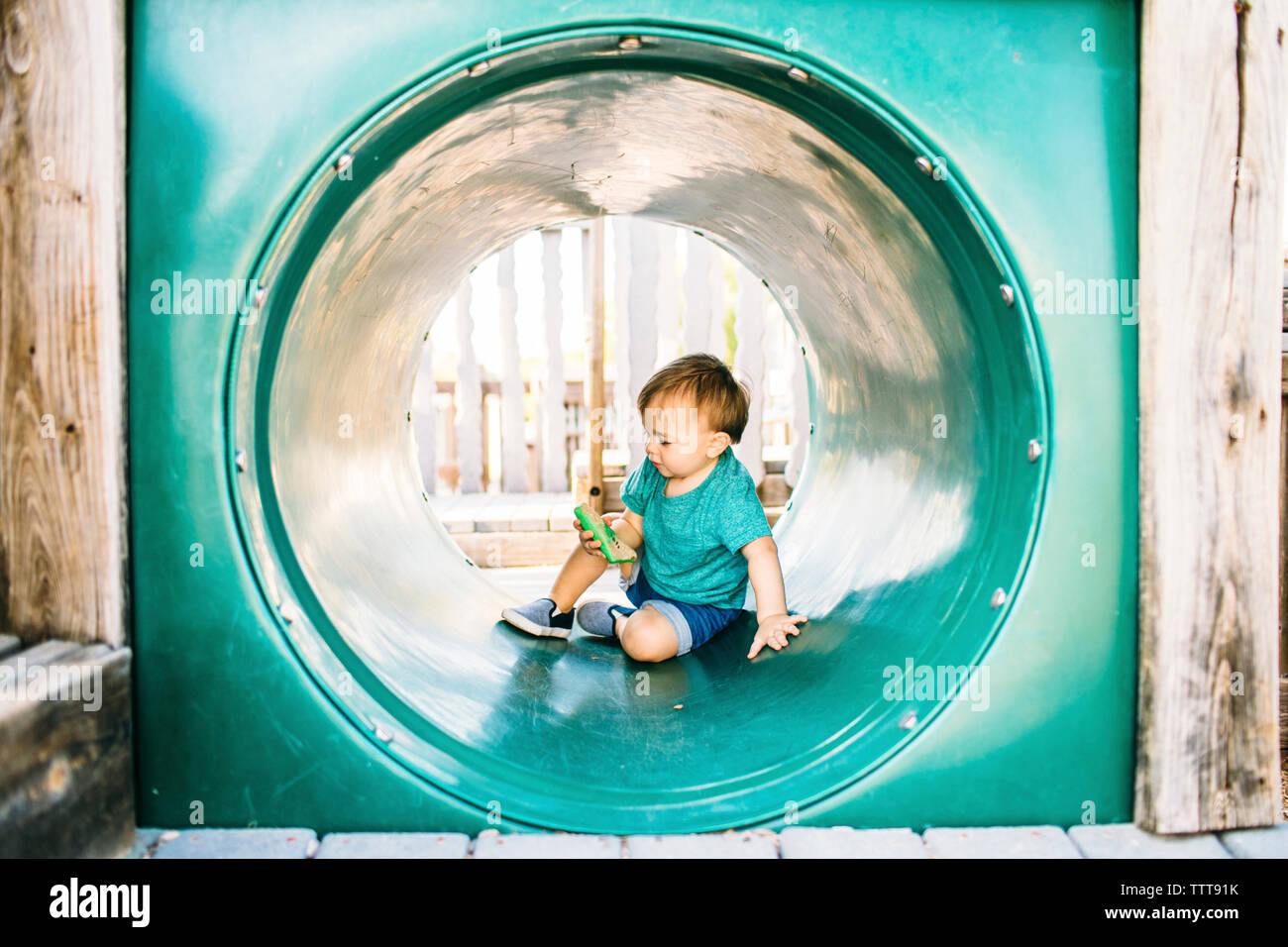 Playground tube hi-res stock photography and images - Alamy