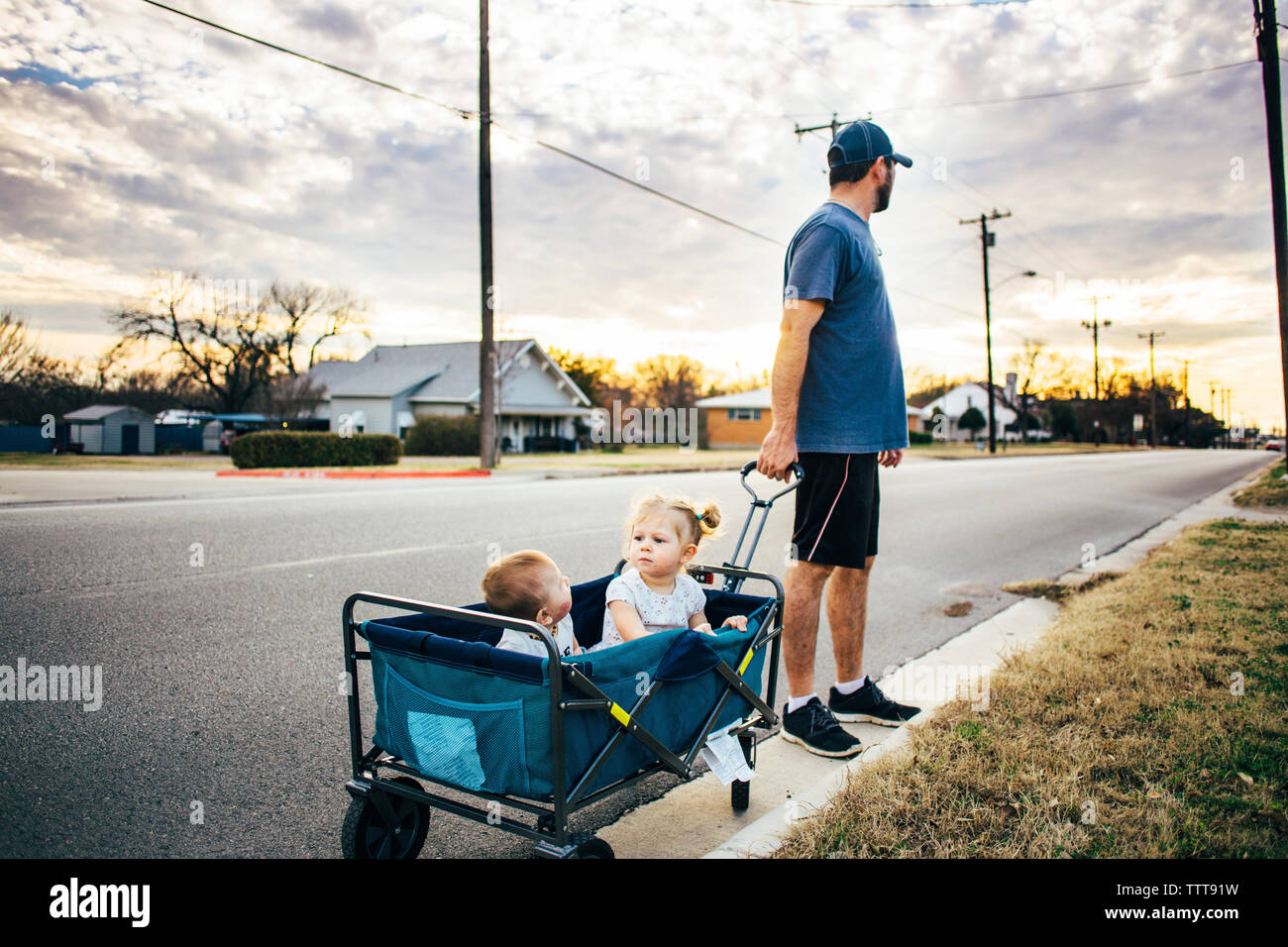 Boy pulling wagon hi-res stock photography and images - Alamy