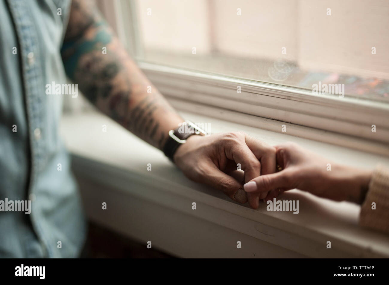 Hands on window hi-res stock photography and images - Alamy