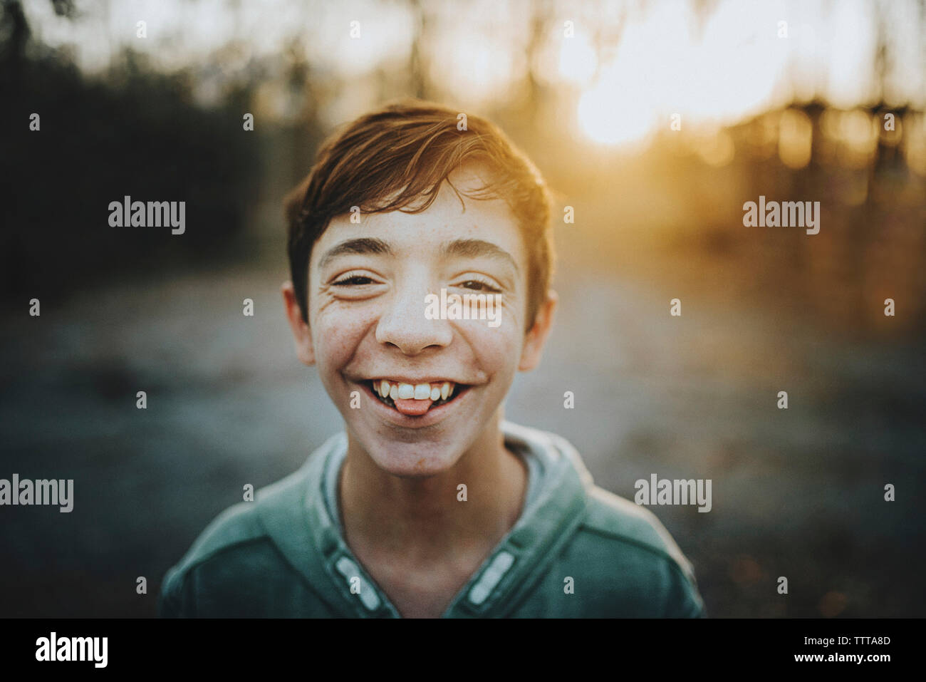 Happy teenage boy smiling hi-res stock photography and images - Alamy