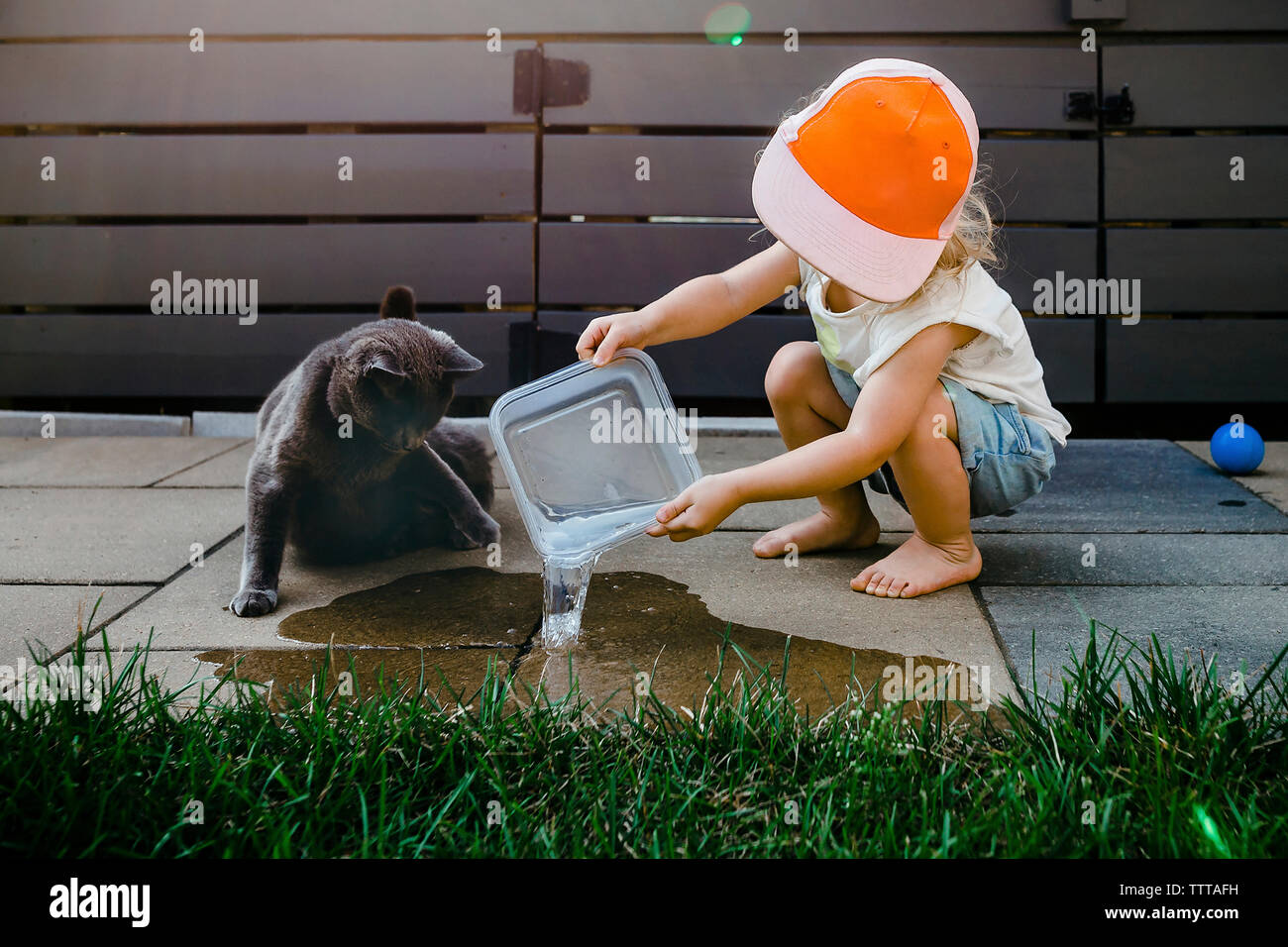 Girl pouring water hi-res stock photography and images - Alamy