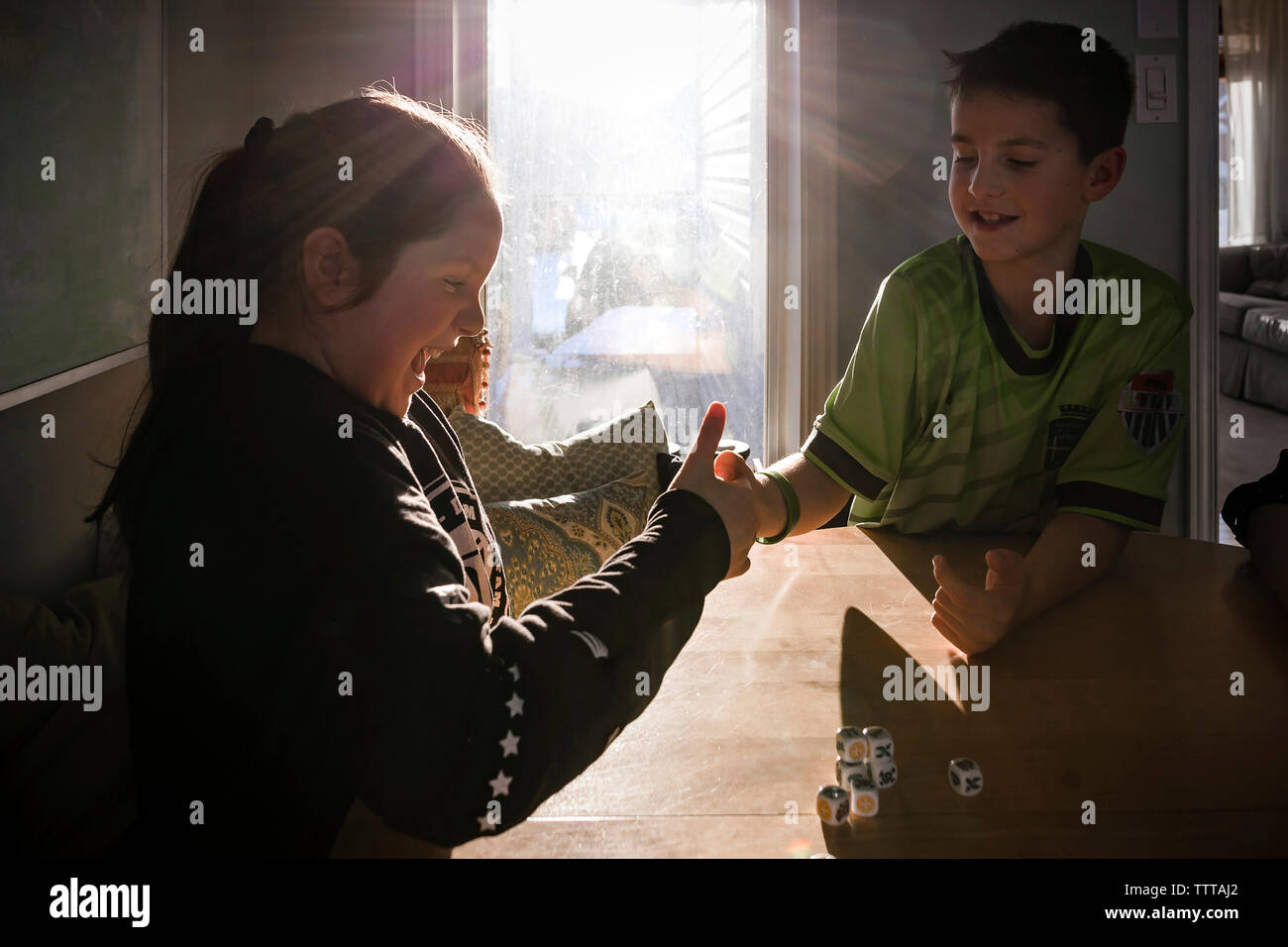 Brother sister fight table hi-res stock photography and images - Alamy