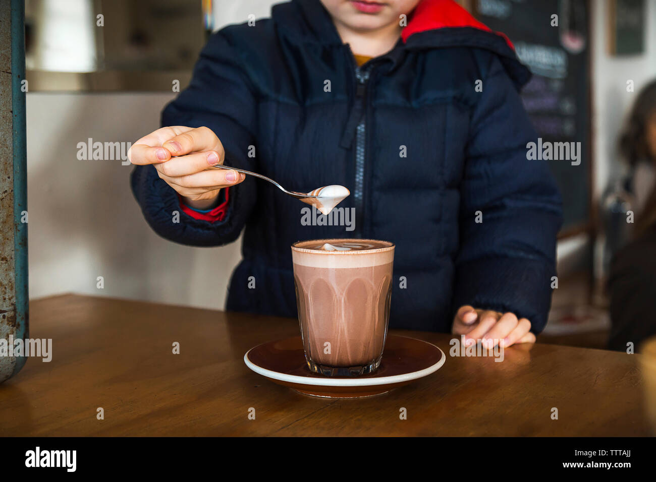 Hands holding spoon hi-res stock photography and images - Alamy