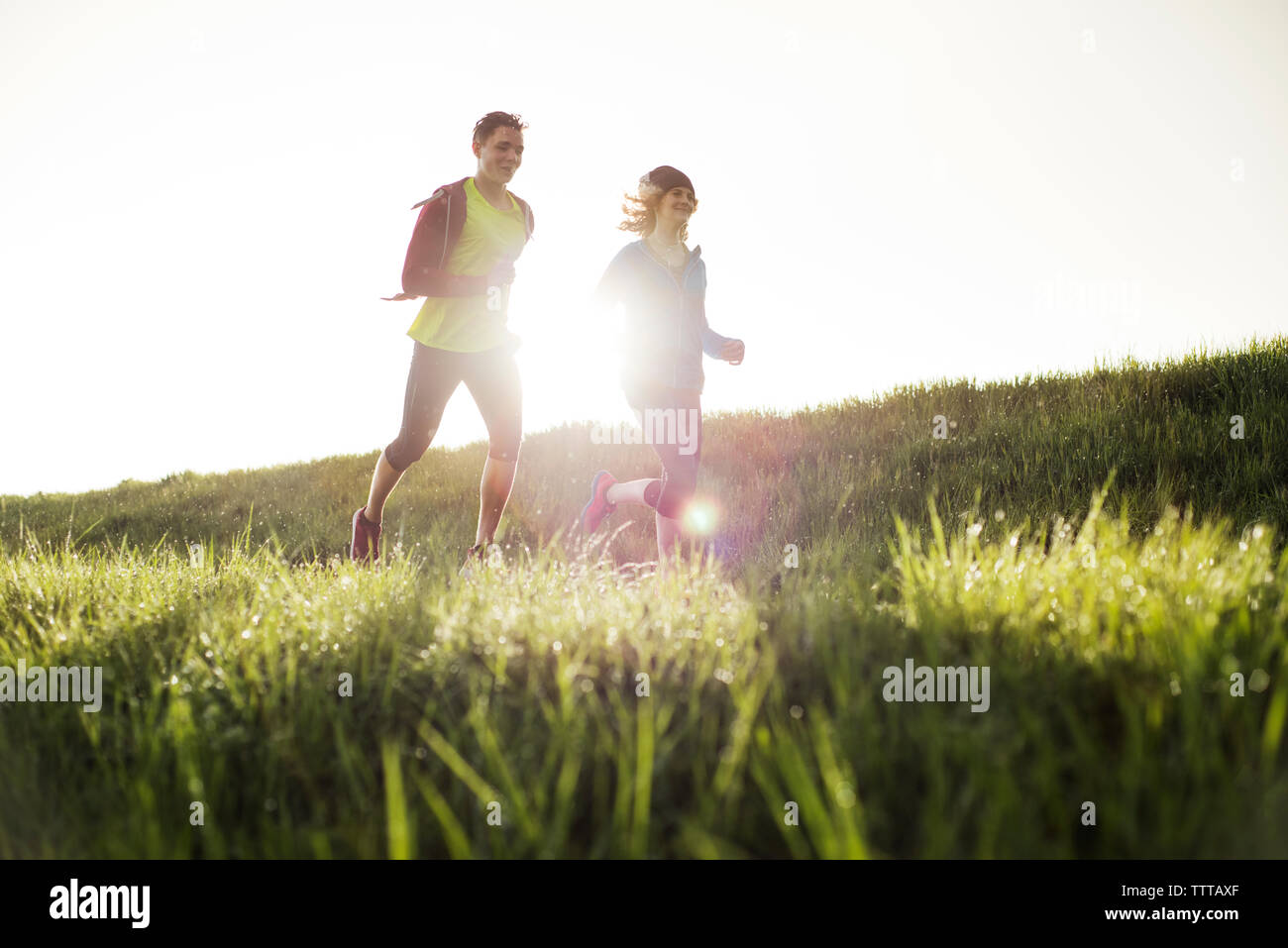 Female fitness friends running on hi-res stock photography and images ...