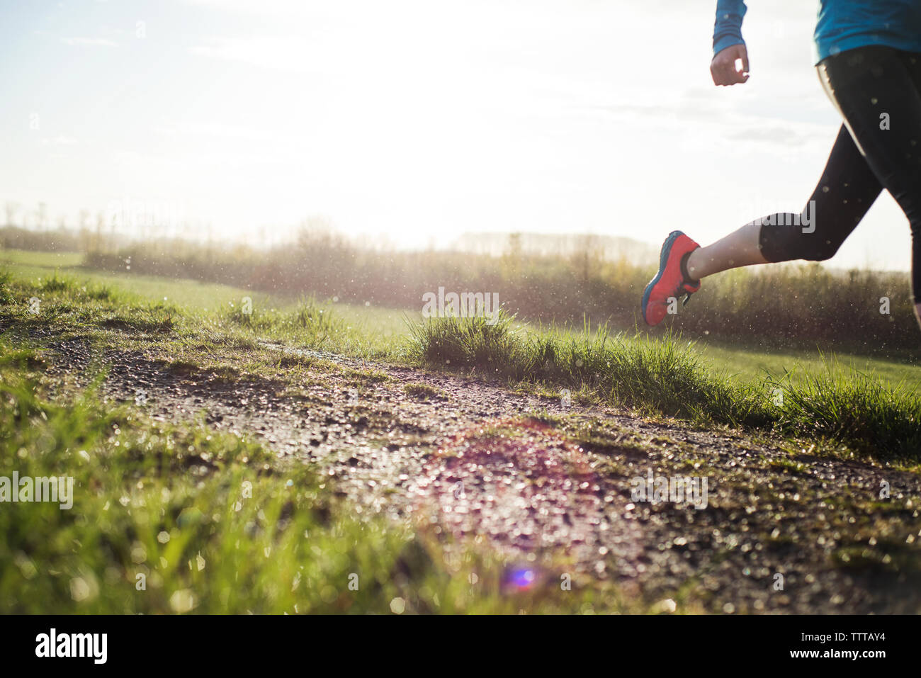 Woman running fitness field hi-res stock photography and images - Alamy