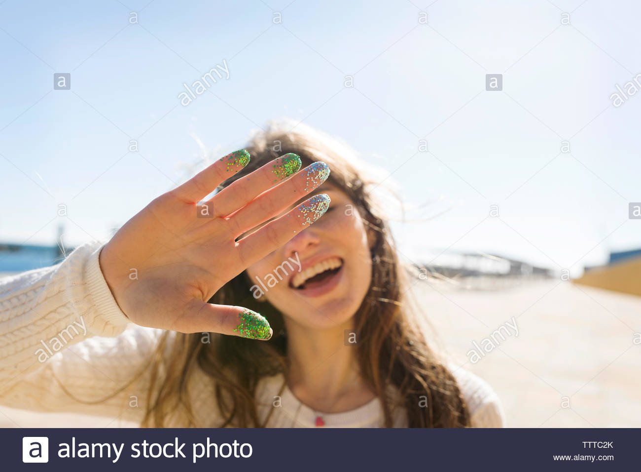 Holding Face High Resolution Stock Photography and Images - Alamy