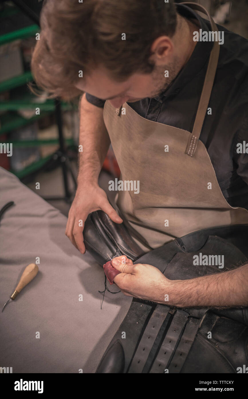 Male shoemaker tools shoes hi-res stock photography and images - Alamy