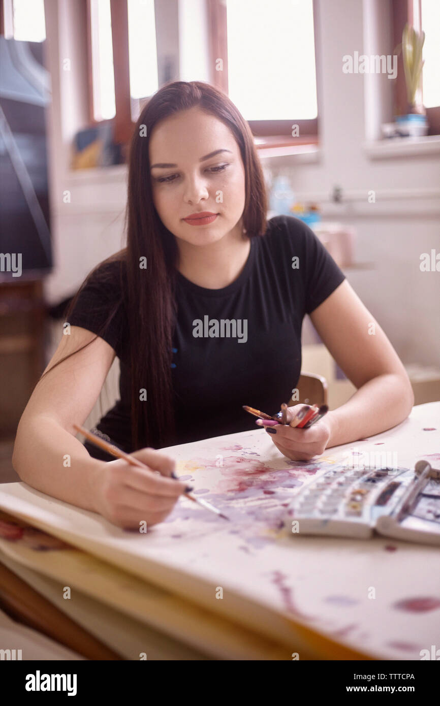 Creativity art sitting preparation concentration holding hi-res stock ...