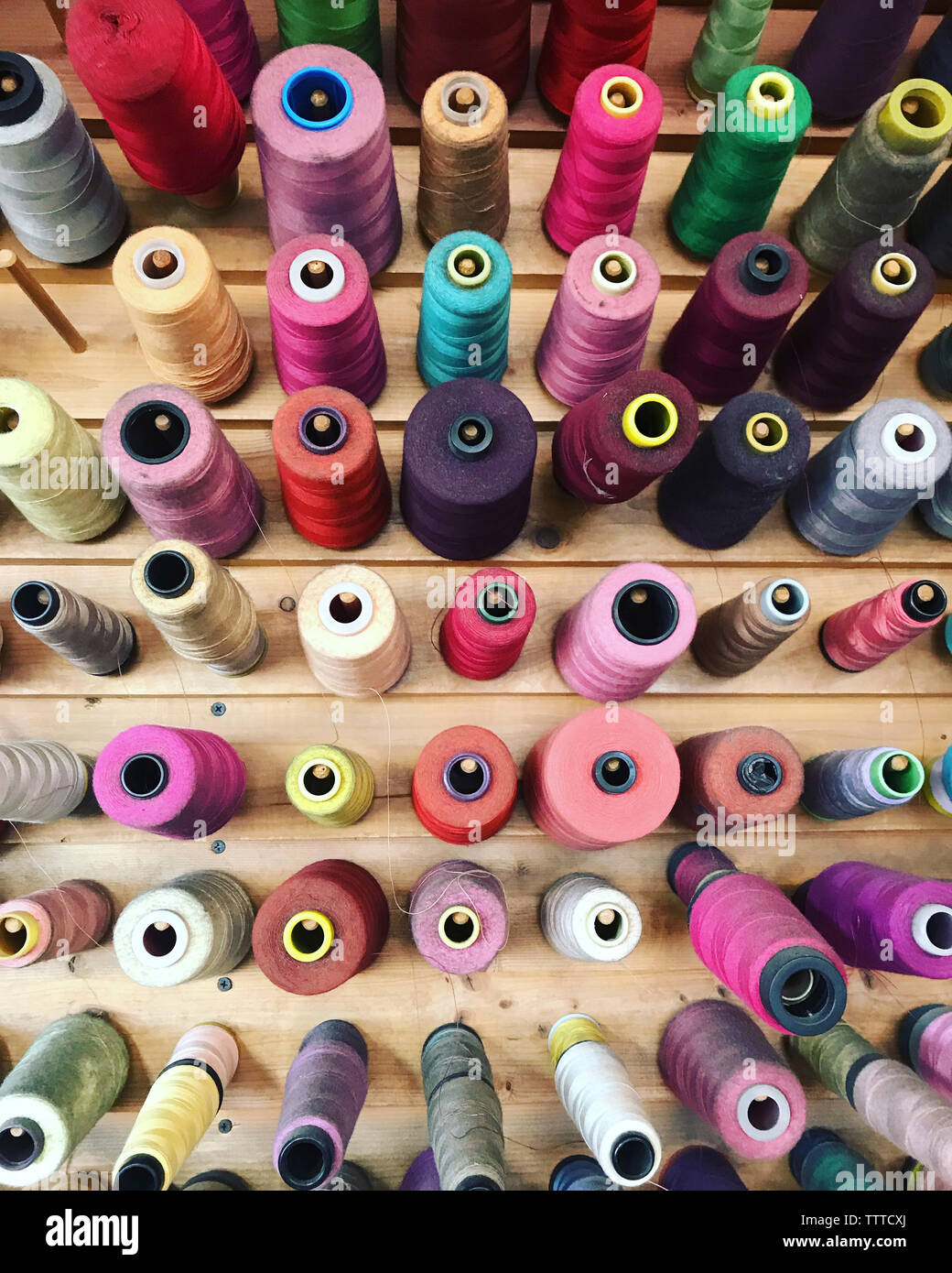 Wooden spools hi-res stock photography and images - Alamy