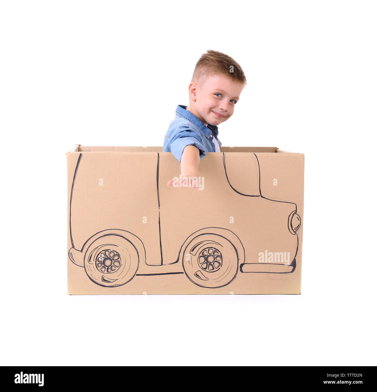 Creative boy playing with cardboard car, isolated on white Stock Photo ...