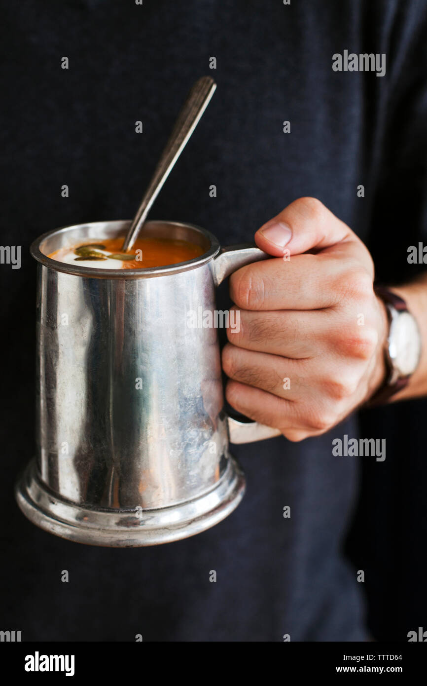 Human hand holding mug hi-res stock photography and images - Alamy