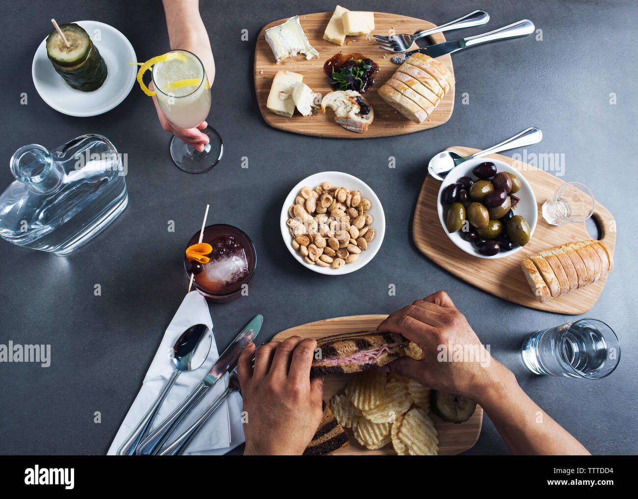 Overhead view of women having food at table Stock Photo - Alamy