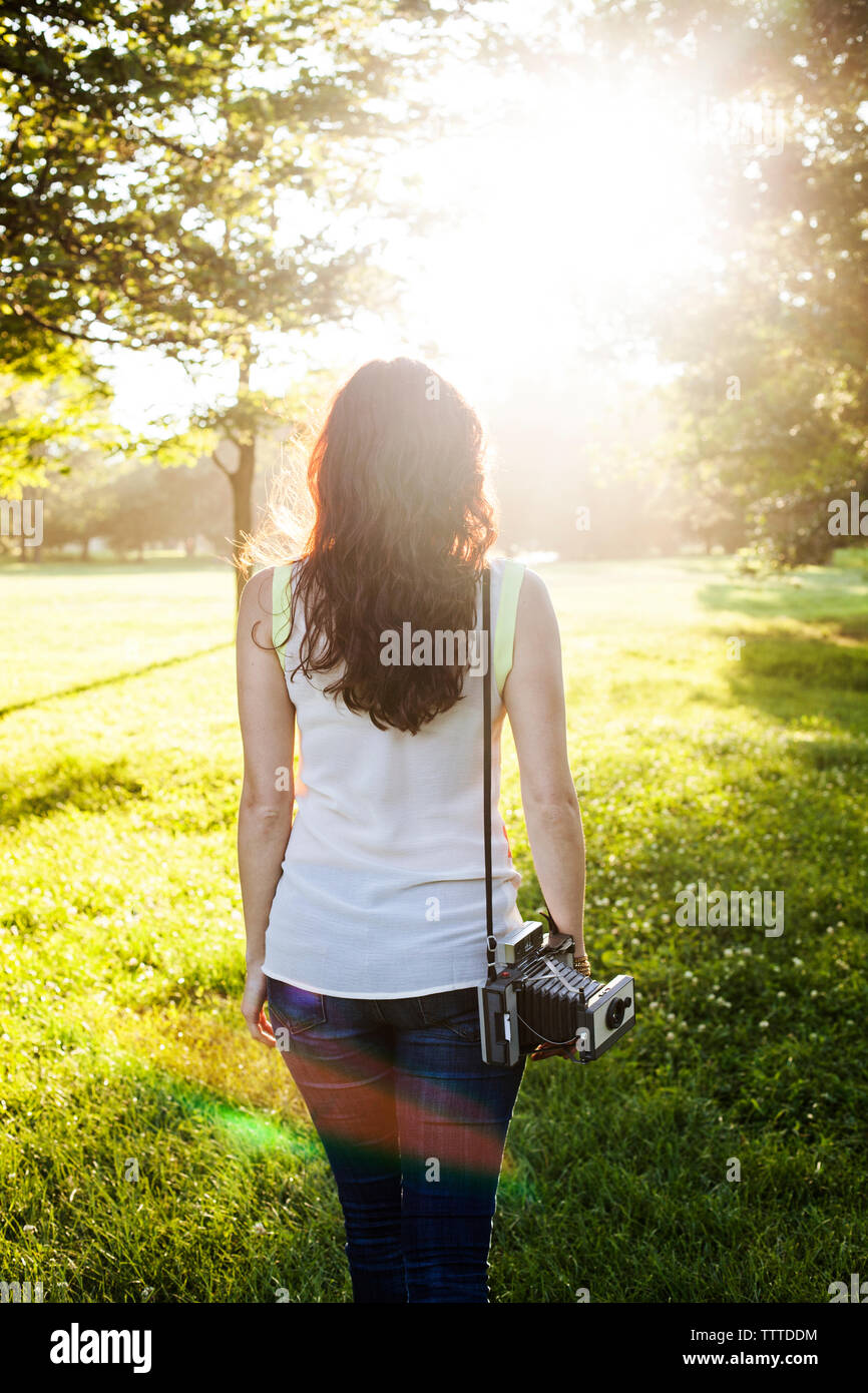 Person standing with back to camera hi-res stock photography and images ...
