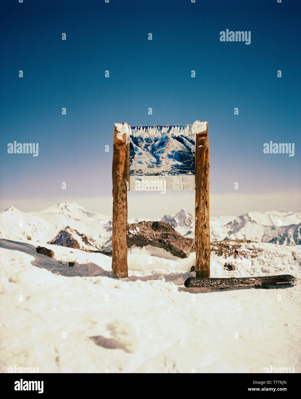 ARGENTINA, Bariloche, Andes, sign board on snow-capped mountain at the ...