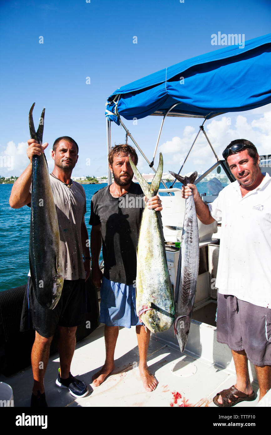 BERMUDA. Local fishermen with posing with Mahi Mahi and King mackerel ...
