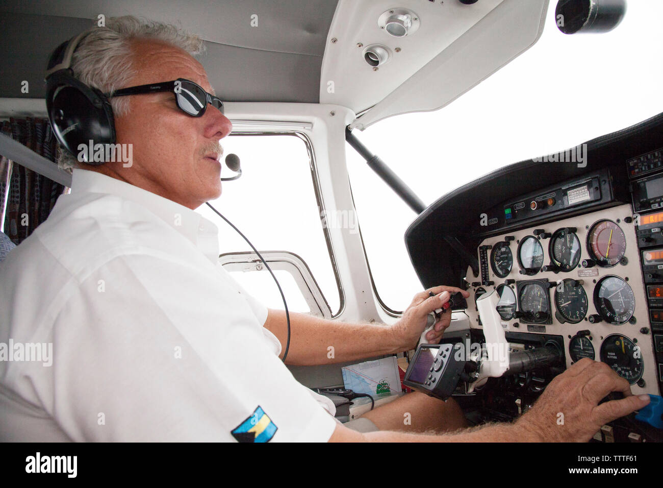 EXUMA, Bahamas. The pilot flying the prop plane towards the Exuma ...