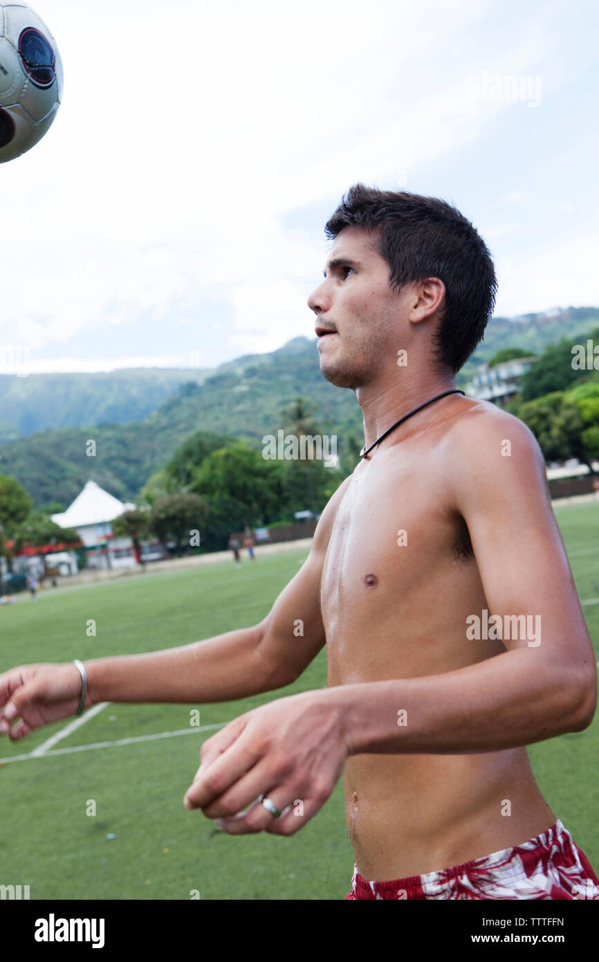 FRENCH POLYNESIA, Tahiti, Papeete. A soccer game between locals at the ...