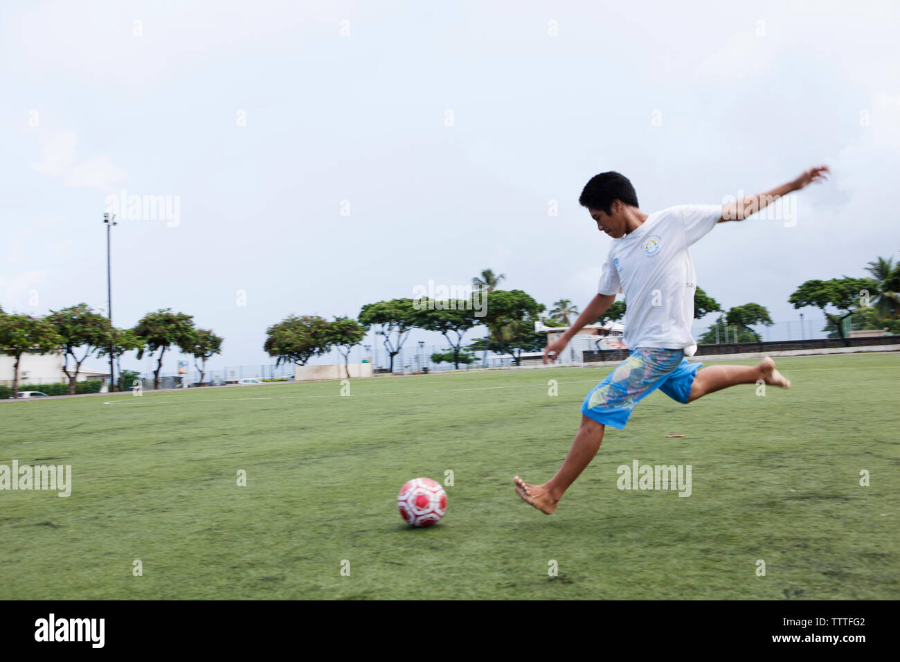 FRENCH POLYNESIA, Tahiti, Papeete. A soccer game between locals at the ...