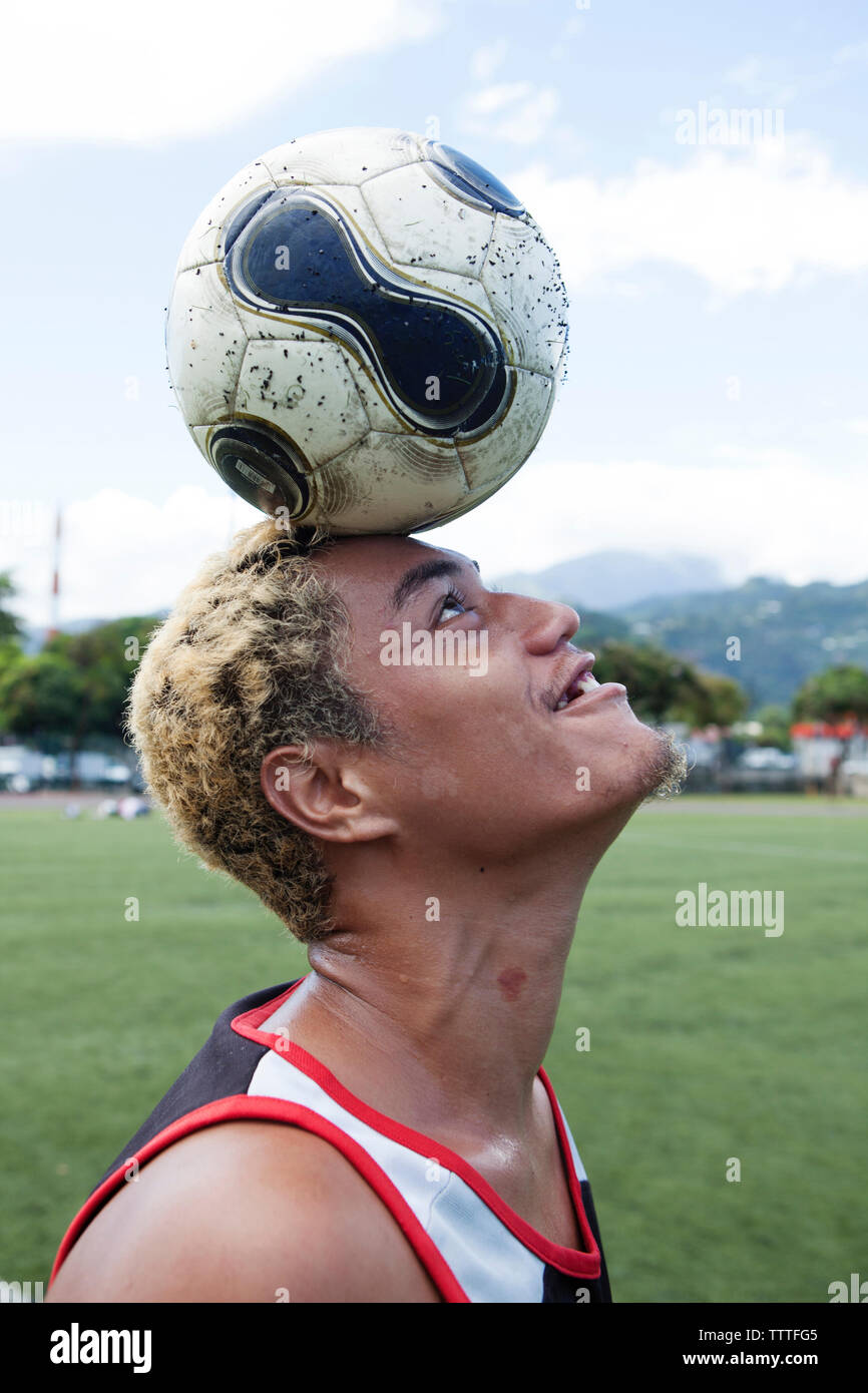 FRENCH POLYNESIA, Tahiti, Papeete. A soccer game between locals at the ...
