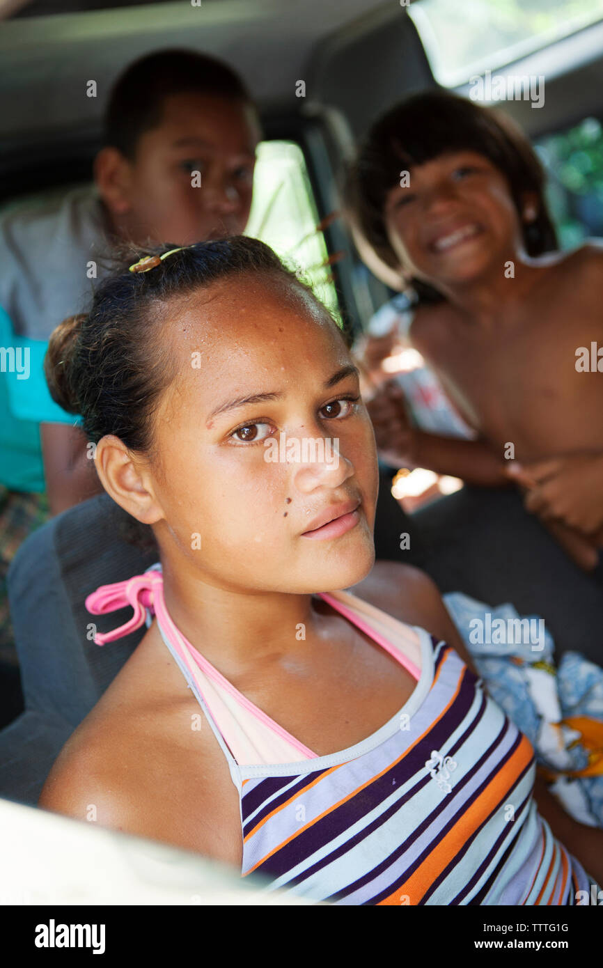 FRENCH POLYNESIA, Moorea Island. Kids in a car Stock Photo - Alamy