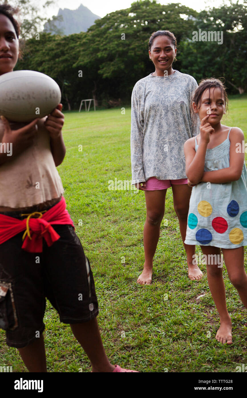 FRENCH POLYNESIA, Moorea. Girls playing at the Uop Honu Park in Moorea ...