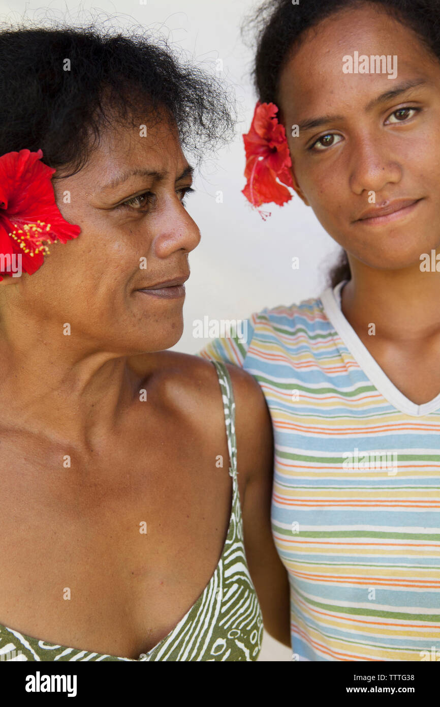 FRENCH POLYNESIA, Moorea. Portrait of woman and her daughter with ...