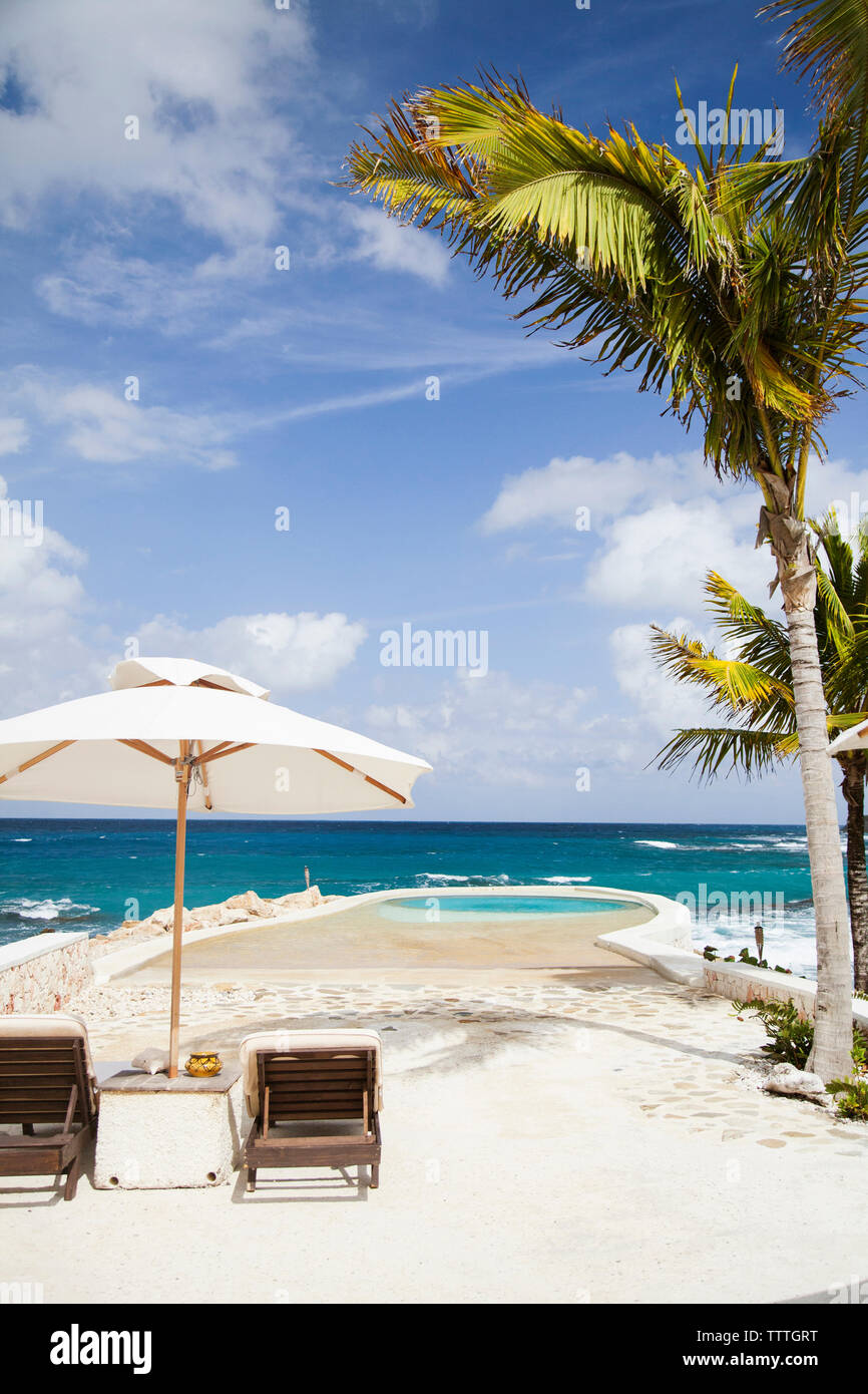 JAMAICA, Oracabessa. Goldeneye hotel and Resort. A view of the pool ...