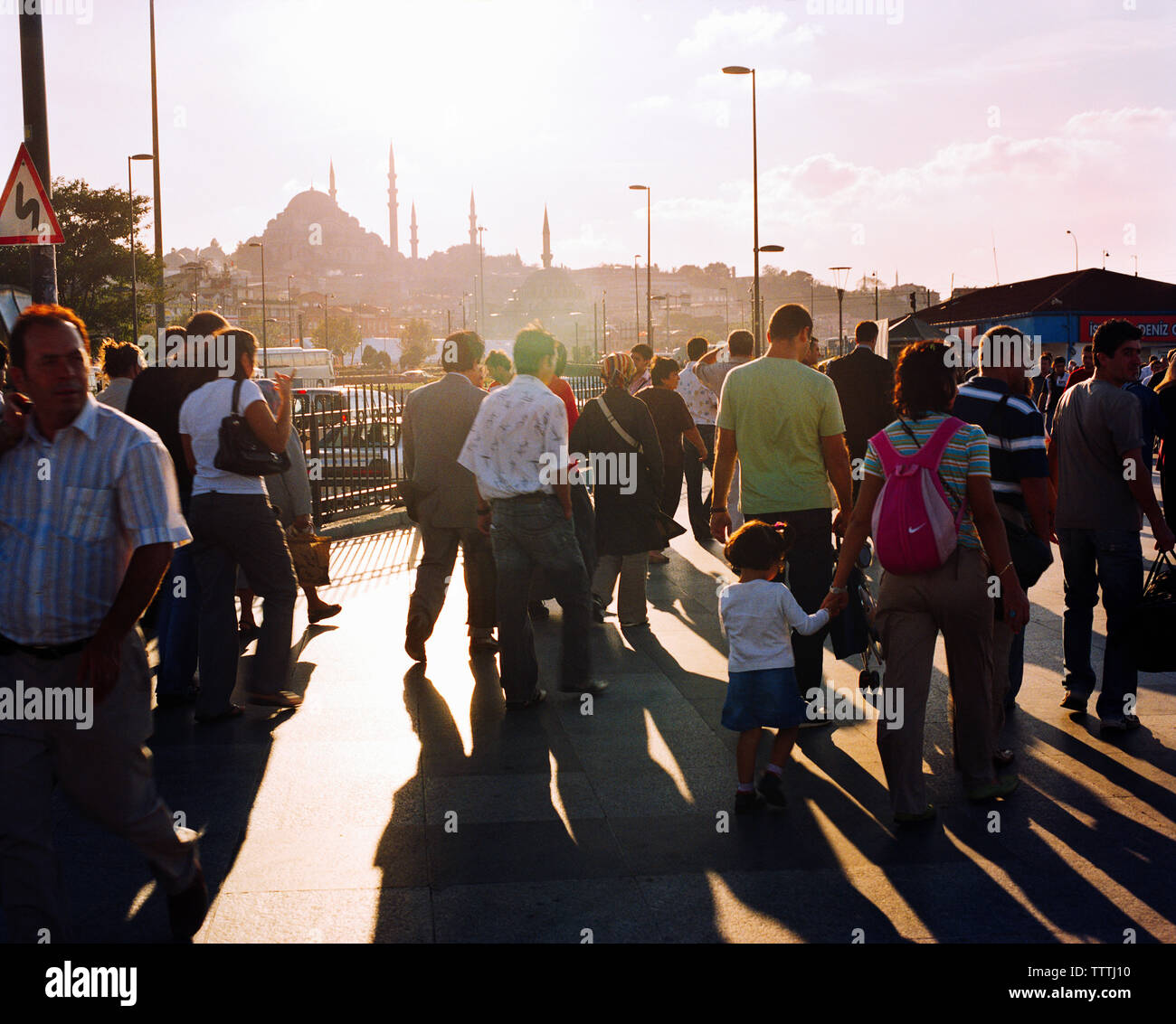 TURKEY, Istanbul, large group of people walking on street with Yeni ...