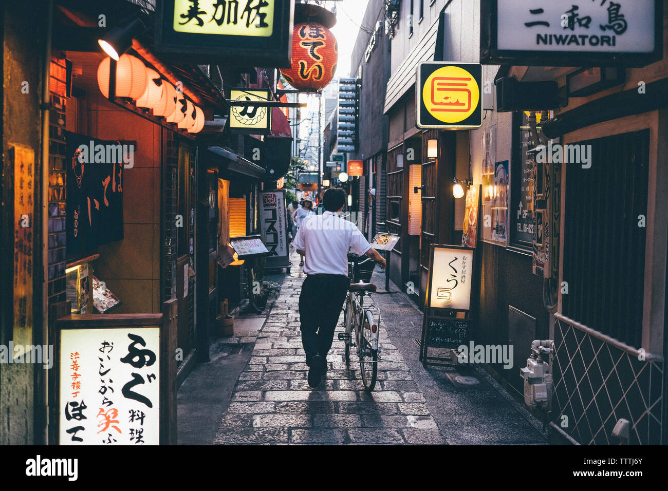 Man walking on paving hi-res stock photography and images - Alamy