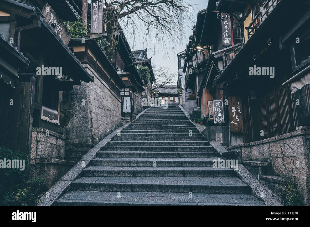 Empty steps amidst buildings in town Stock Photo - Alamy