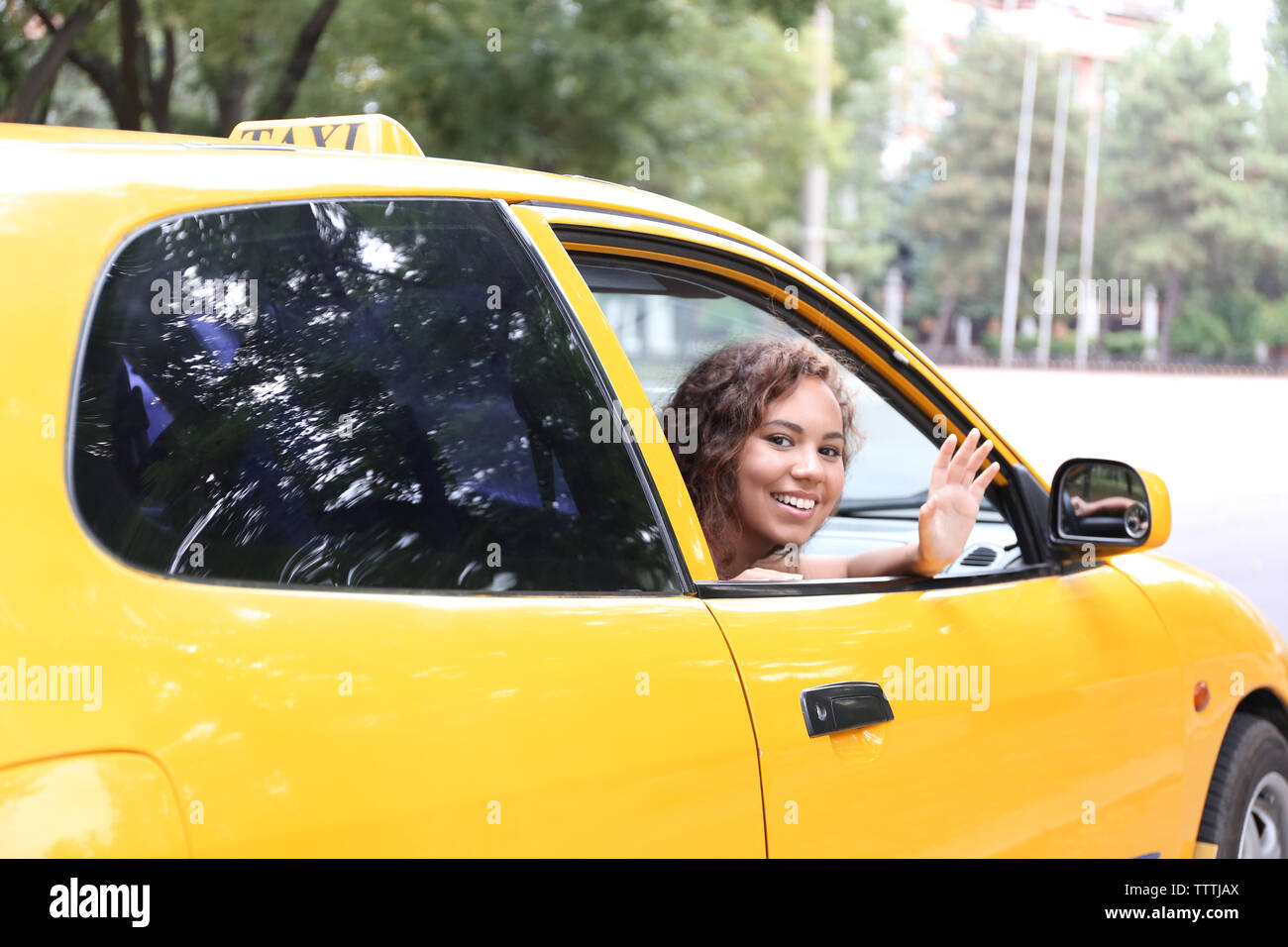 Beautiful girl in taxi car Stock Photo - Alamy