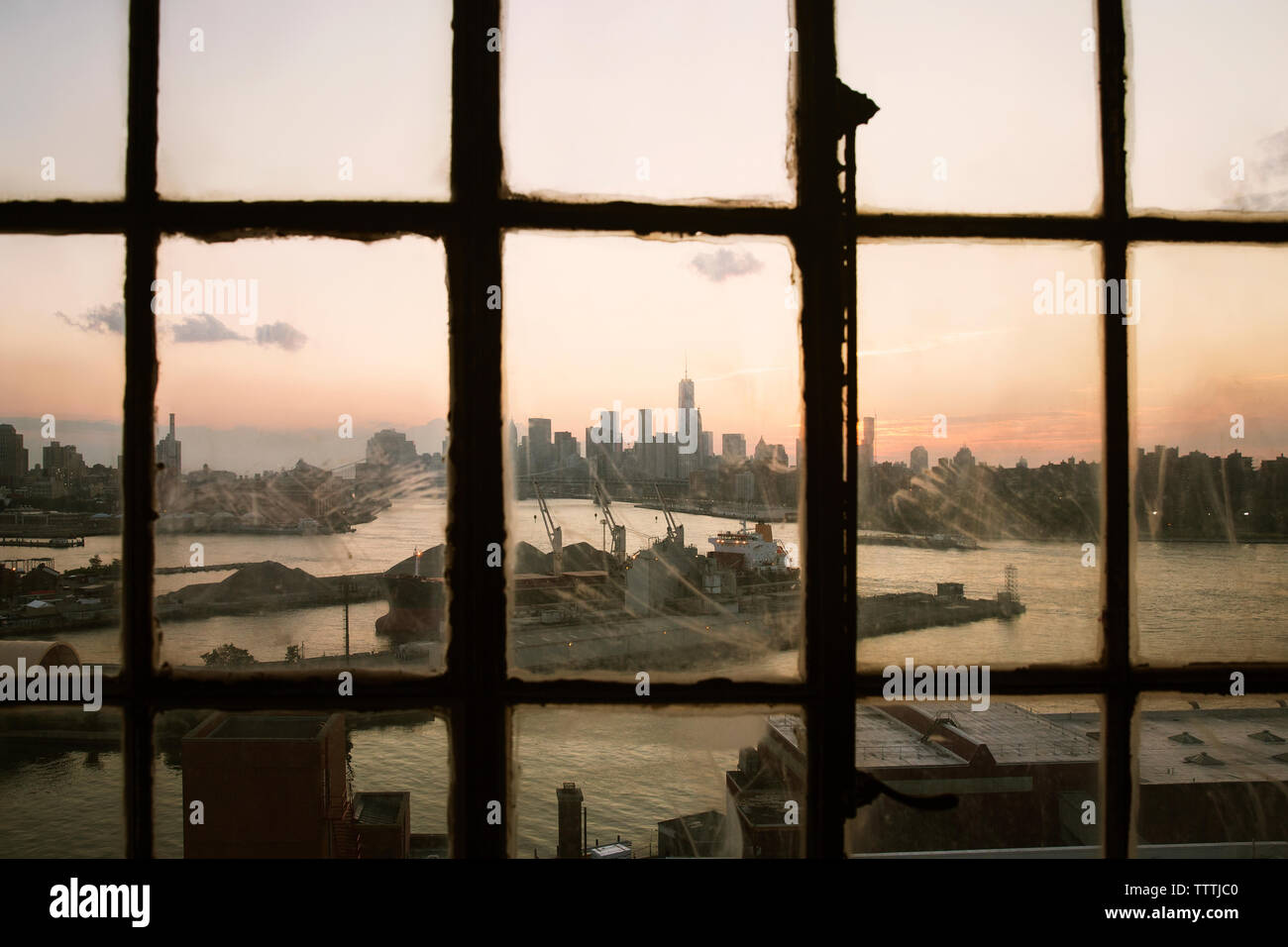 City seen through window hi-res stock photography and images - Alamy