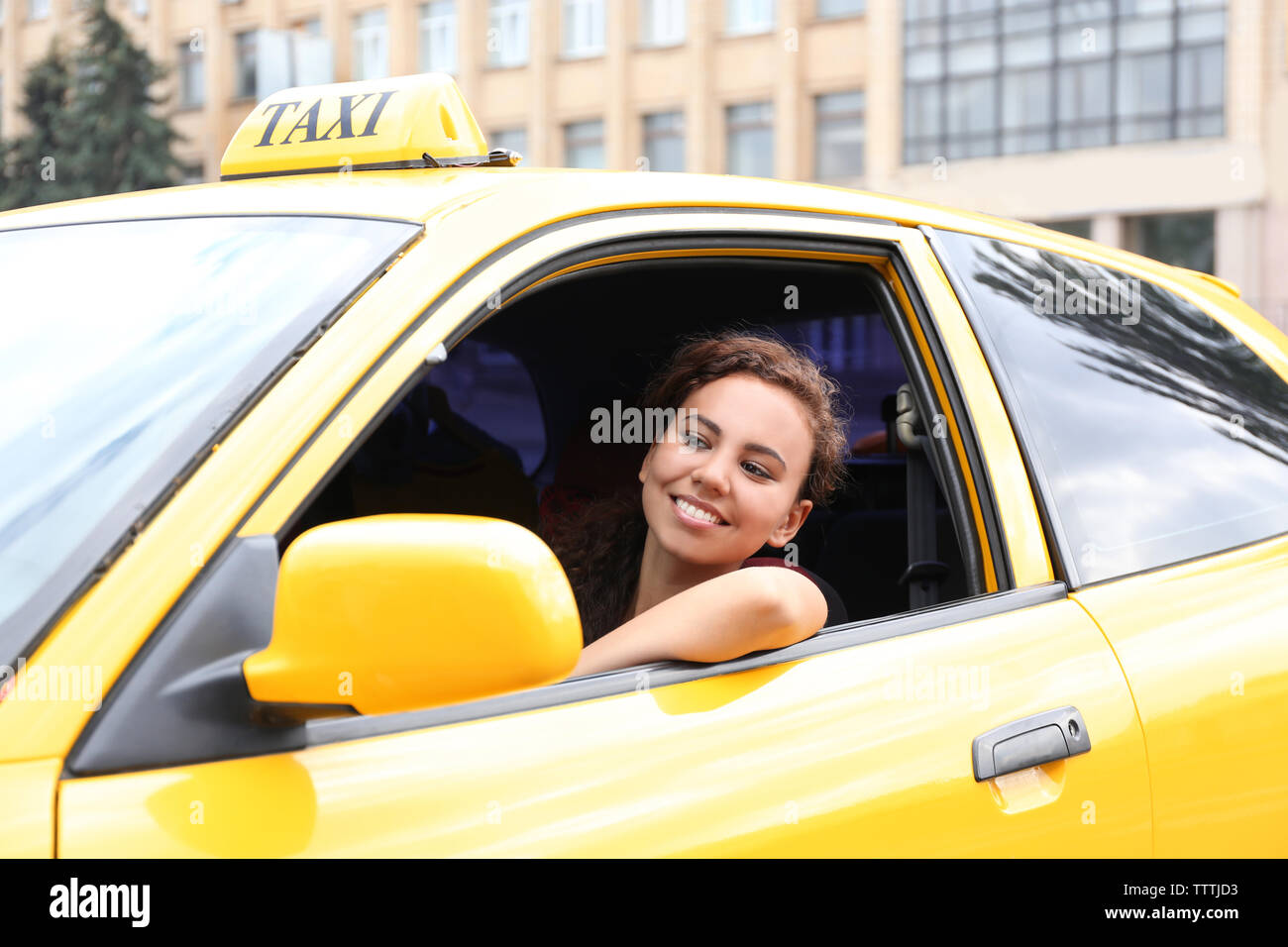 Female taxi driver in car Stock Photo - Alamy
