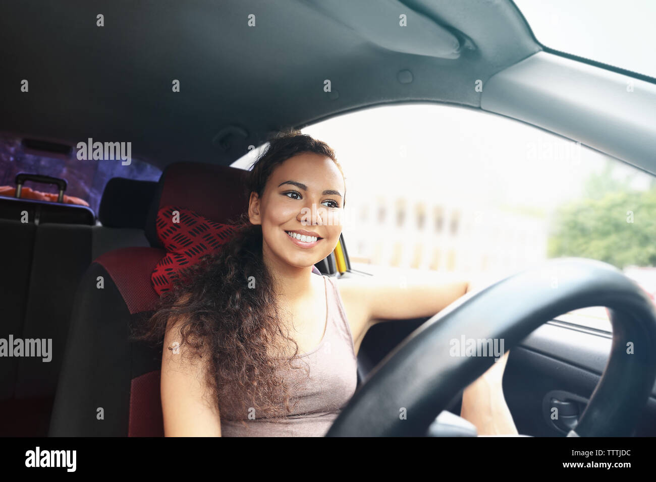 Female taxi driver in car Stock Photo - Alamy