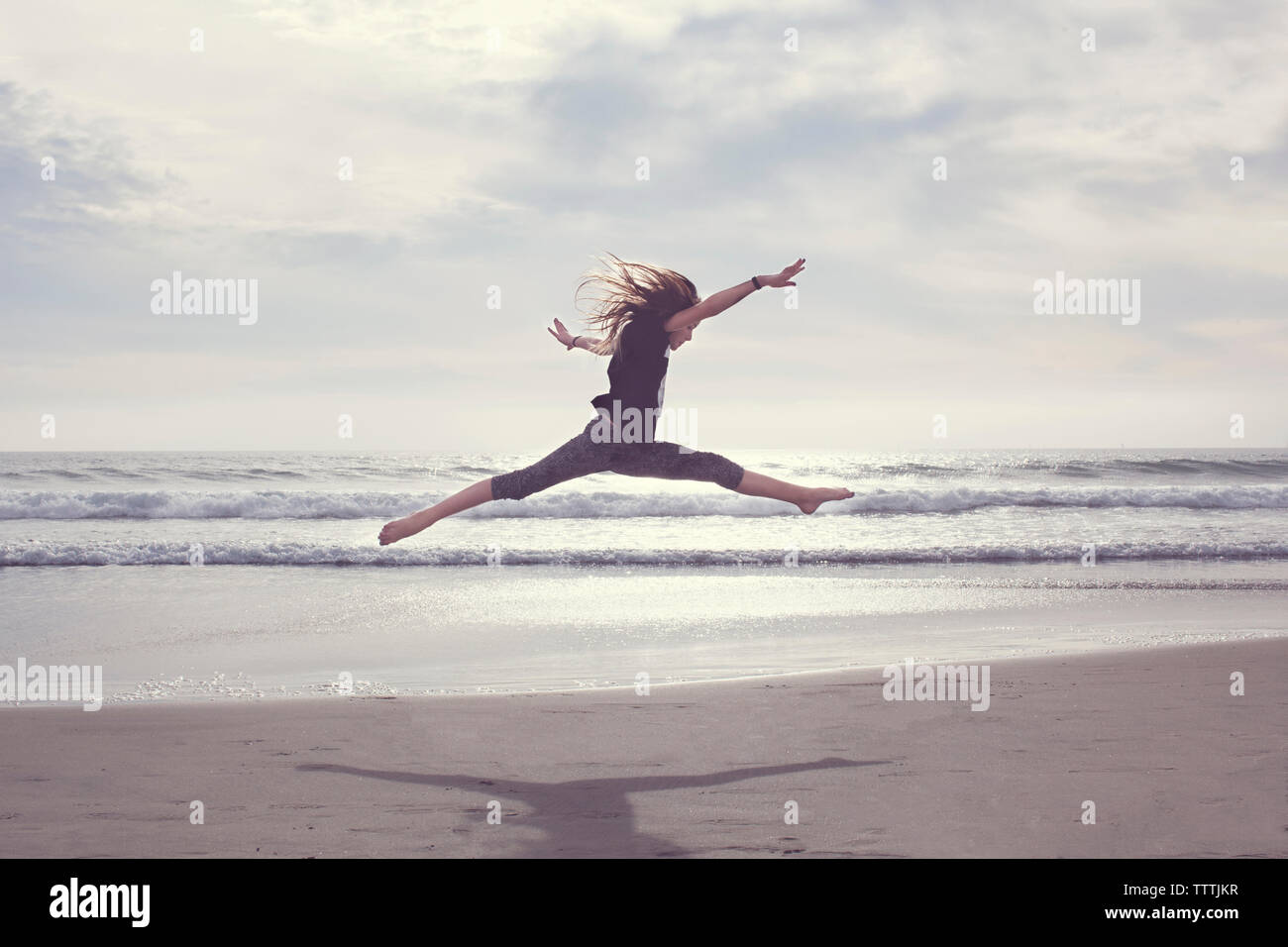 Old person beach jumping hi-res stock photography and images - Alamy